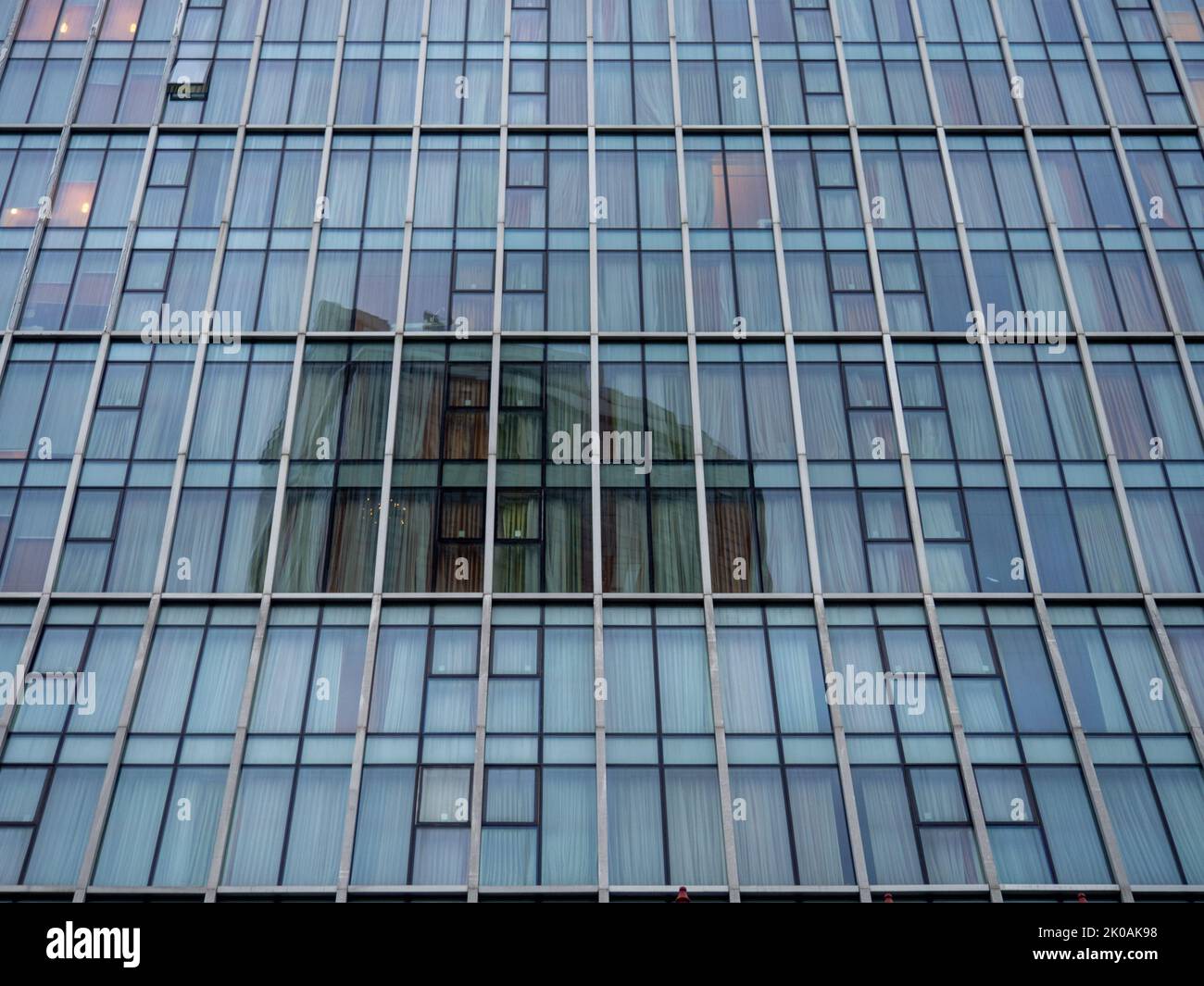 The windows of a high-rise building. Building monolith. Hotel windows ...