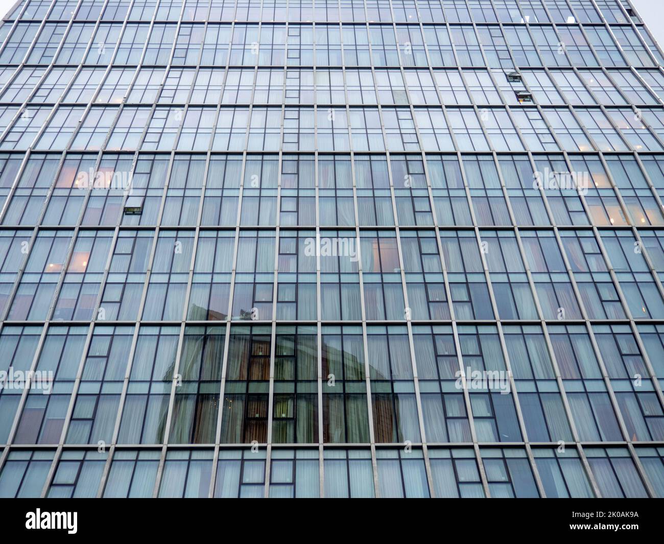 The windows of a high-rise building. Building monolith. Hotel windows ...