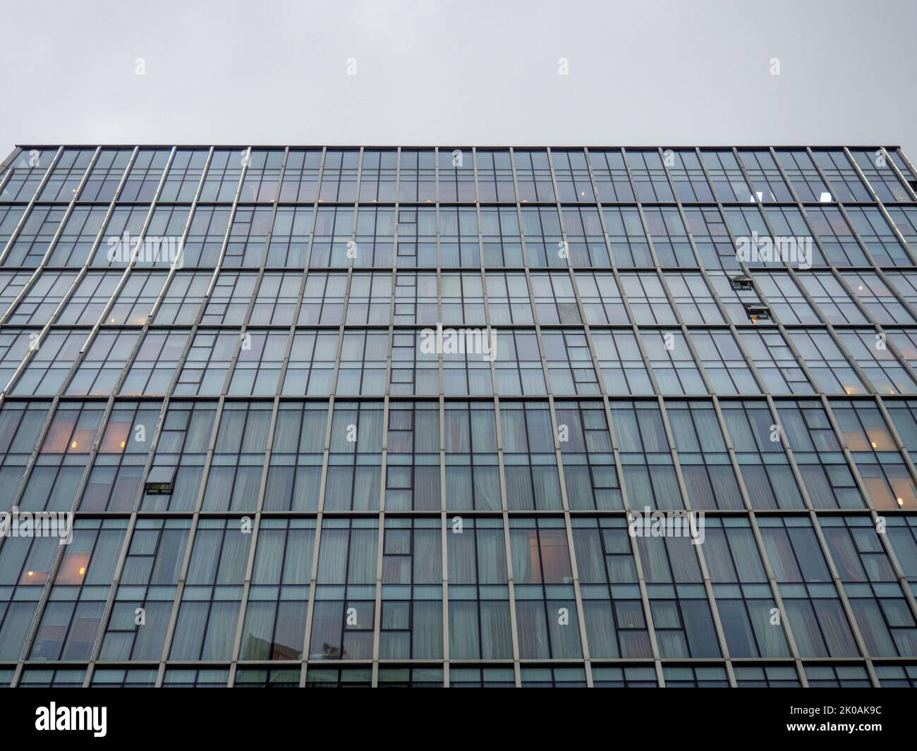 The windows of a high-rise building. Building monolith. Hotel windows ...