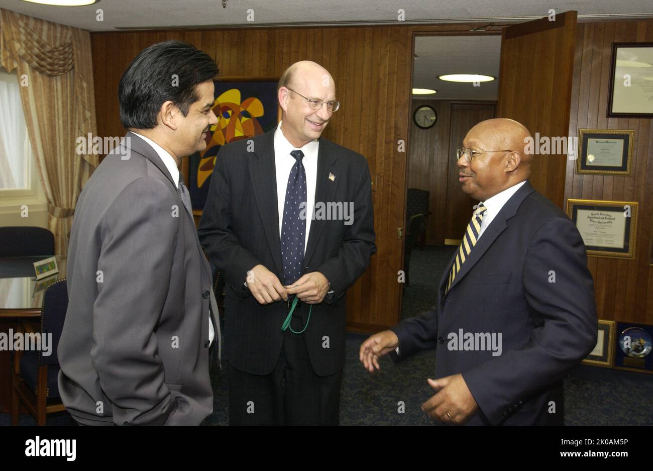 Secretary Alphonso Jackson with Pat Howard and Bajinder Paul ...