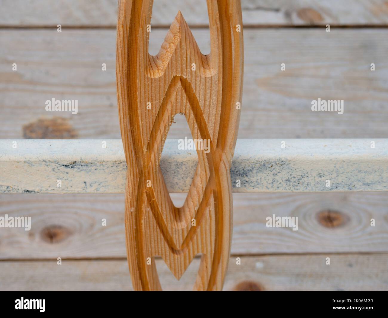 Carved wooden rail. Beautiful handrails. Wooden decoration on the fence ...