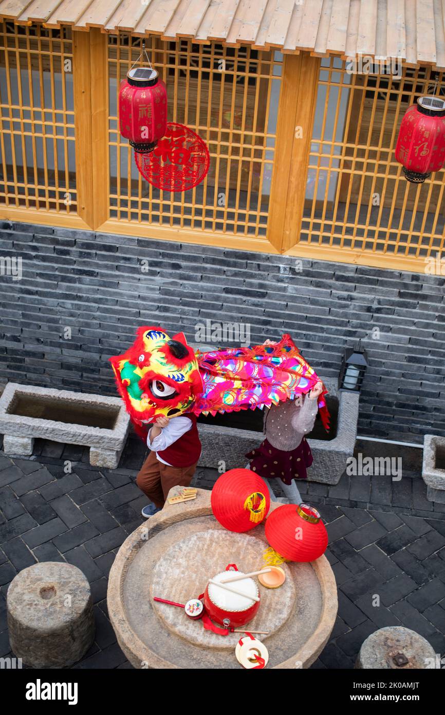 Chinese traditional lion dancing Stock Photo - Alamy