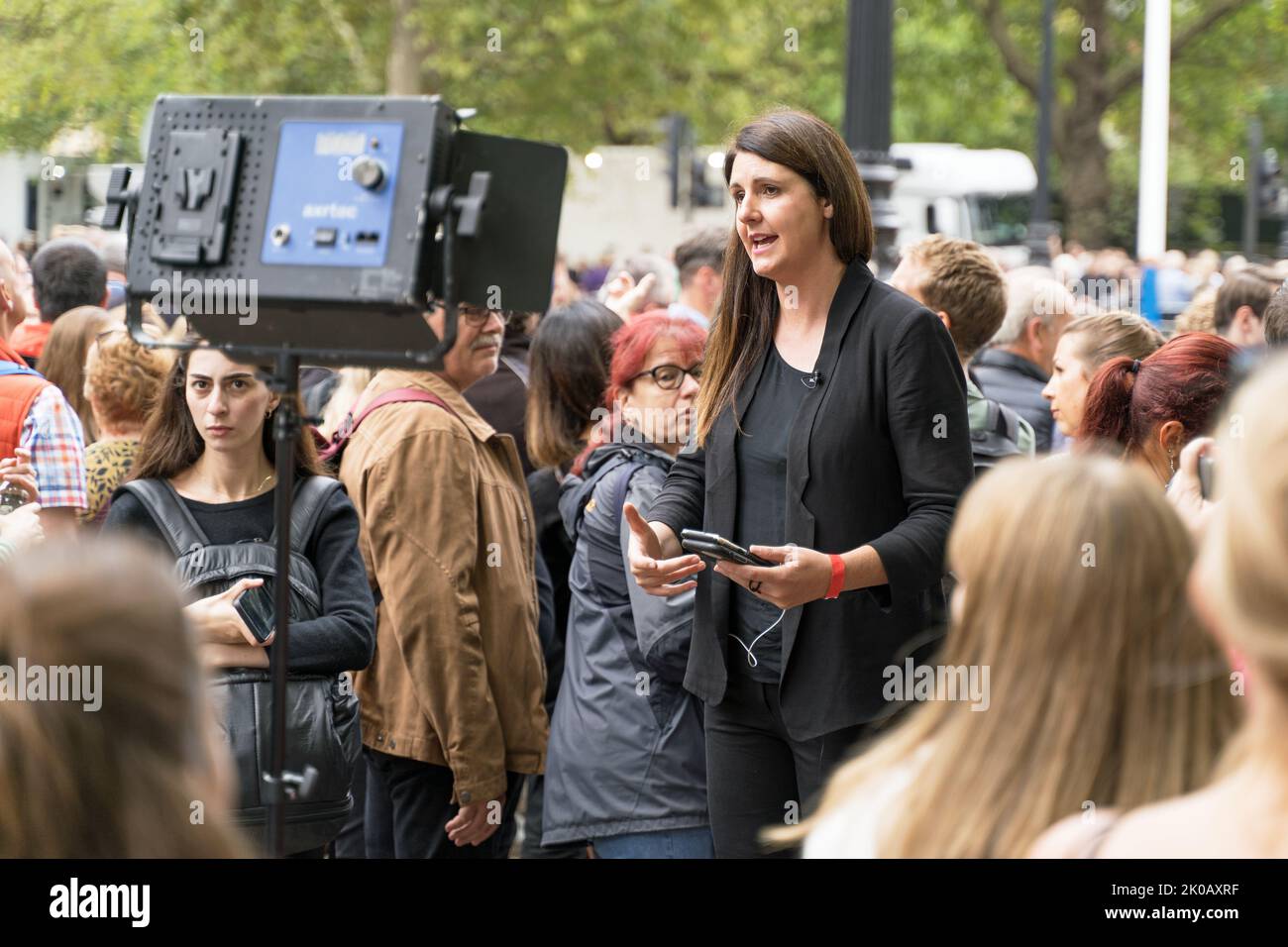 Female news reporter in The Mall reporting on the death of Queen ...