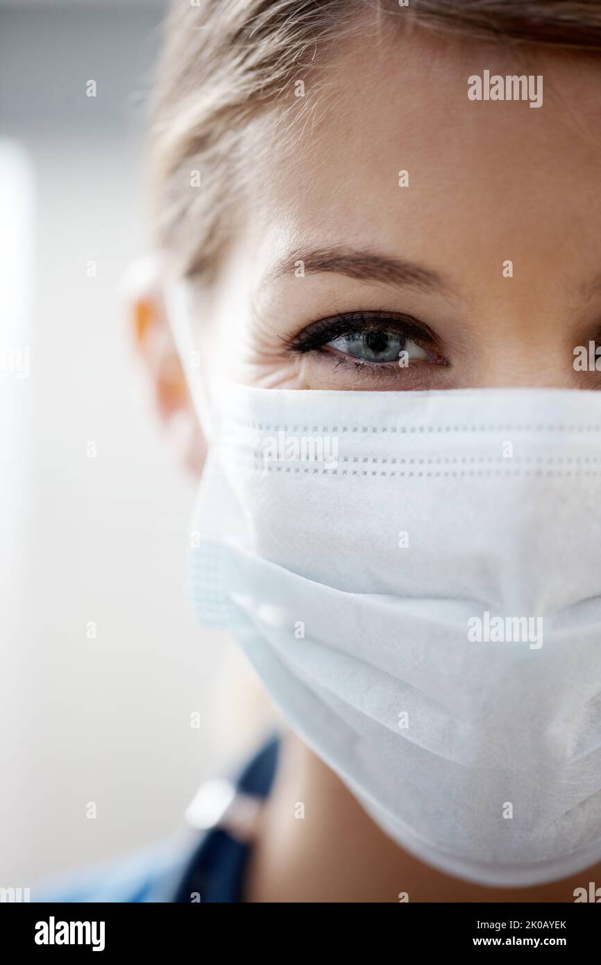 Getting ready for the operation. Cropped image of a female surgeon ...