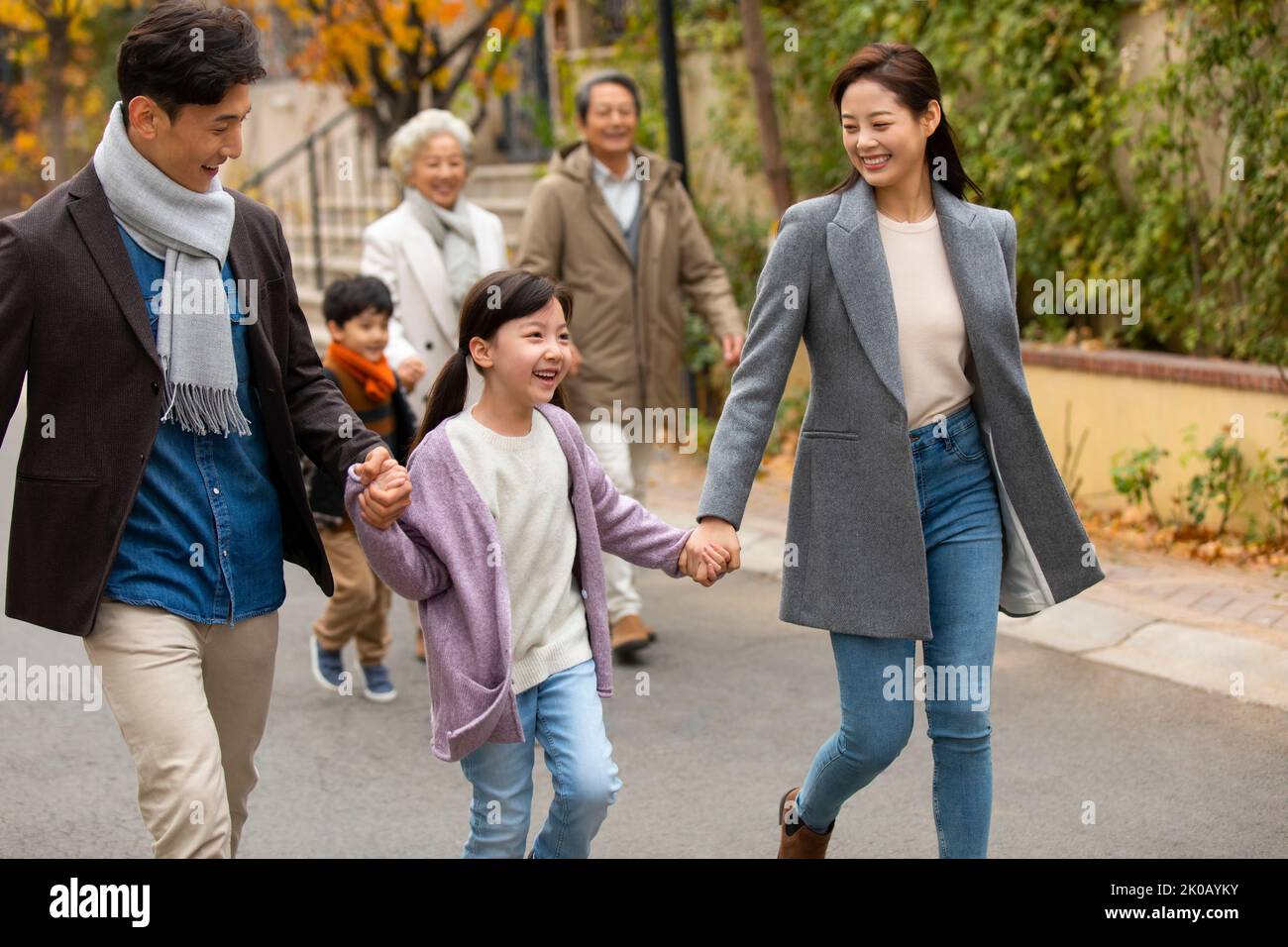 Chinese family taking a walk Stock Photo - Alamy