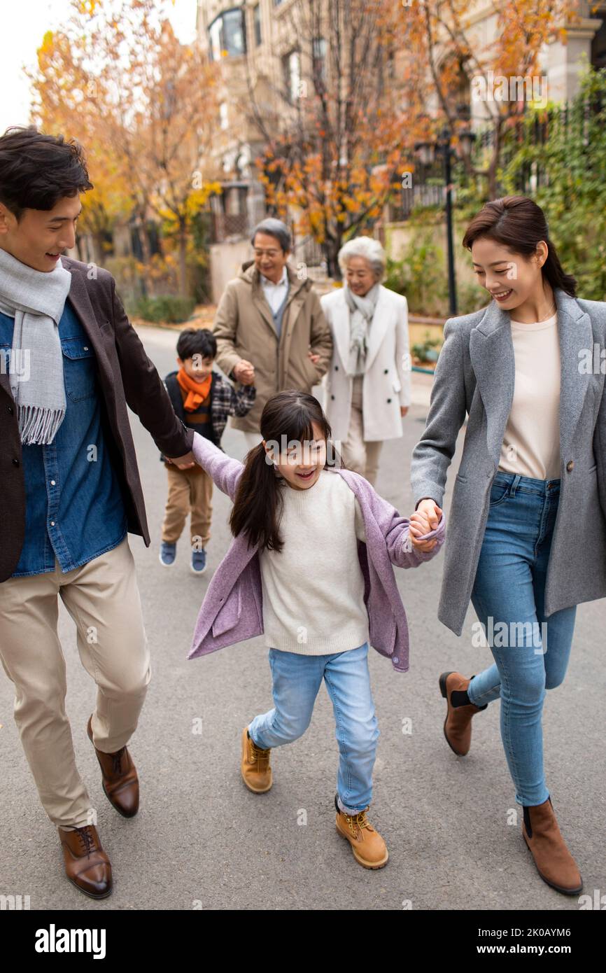 Chinese family taking a walk Stock Photo - Alamy