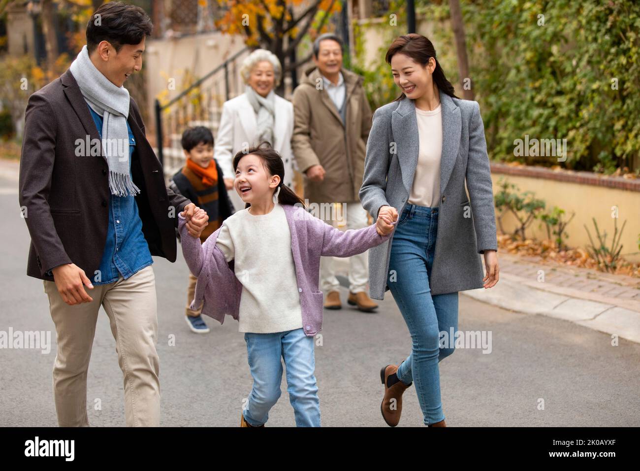 Chinese family taking a walk Stock Photo - Alamy
