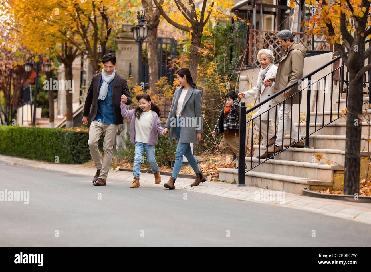 Chinese family taking a walk Stock Photo - Alamy