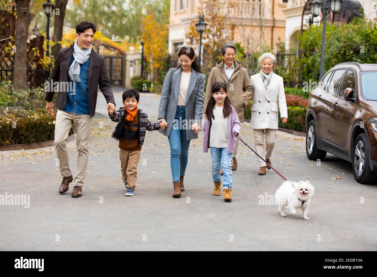 Chinese family taking a walk Stock Photo - Alamy