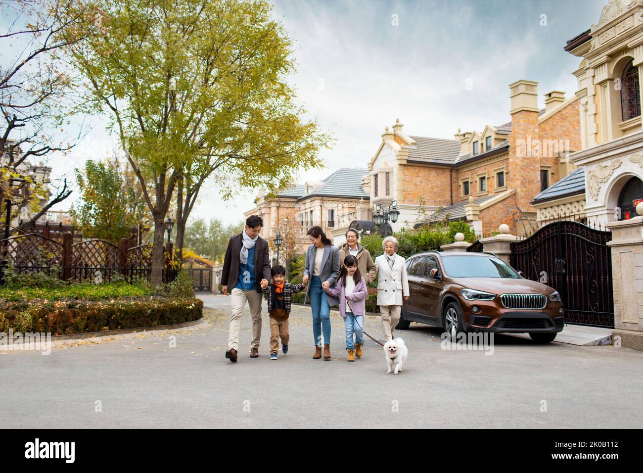 Asian family pets walk hi-res stock photography and images - Alamy