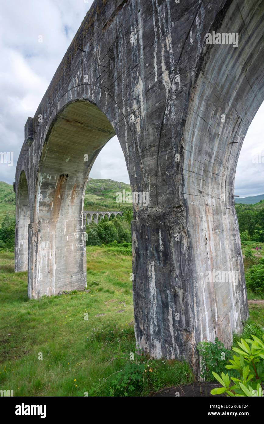 Looking up at the tall,narrow,and impressive viaduct that carries the ...