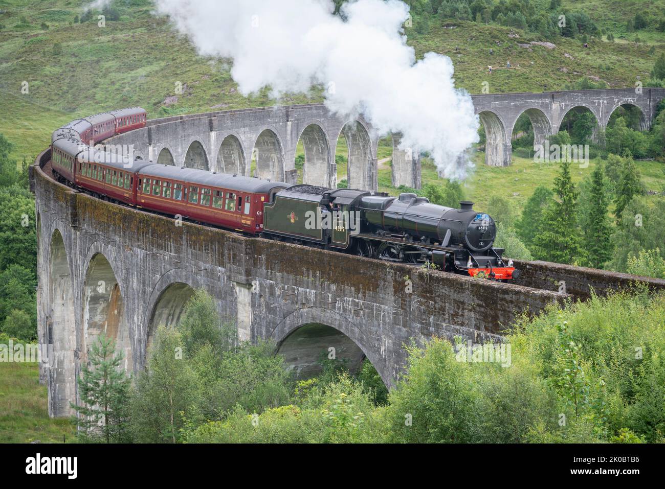 World famous bridge,framed by green trees,in the West Scottish ...