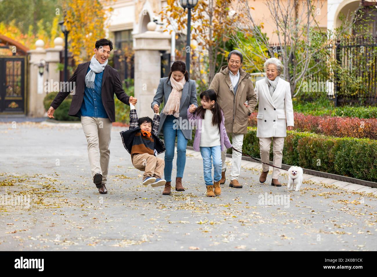 Chinese family taking a walk Stock Photo - Alamy
