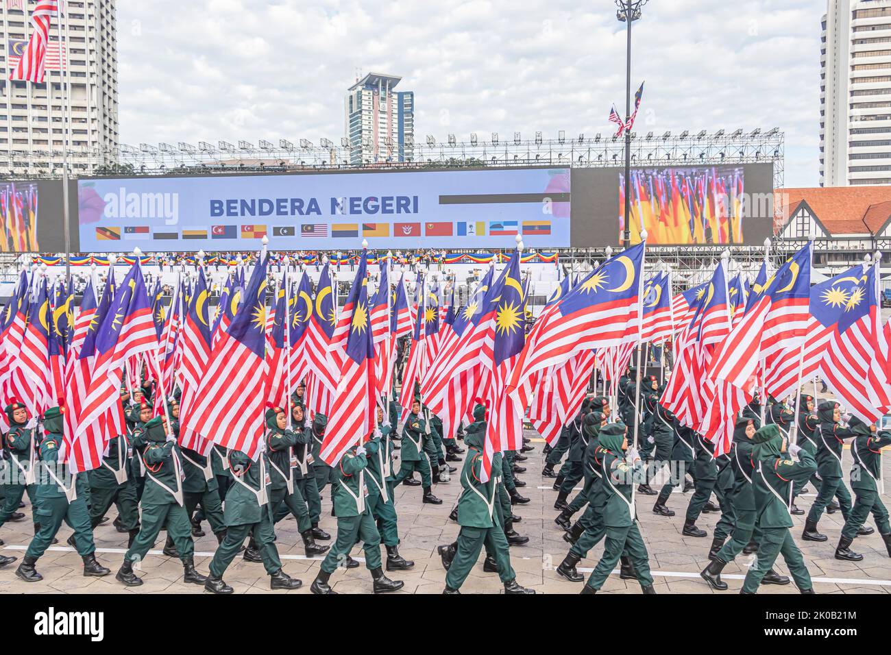 Teenage Malaysians from Malaysian School Youth Cadet Corps marching ...