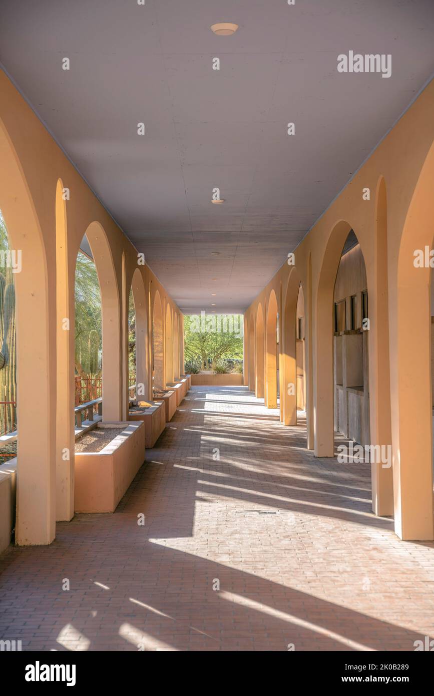 Passageway with arched pillars at downtown Tucson, Arizona. Walkway ...