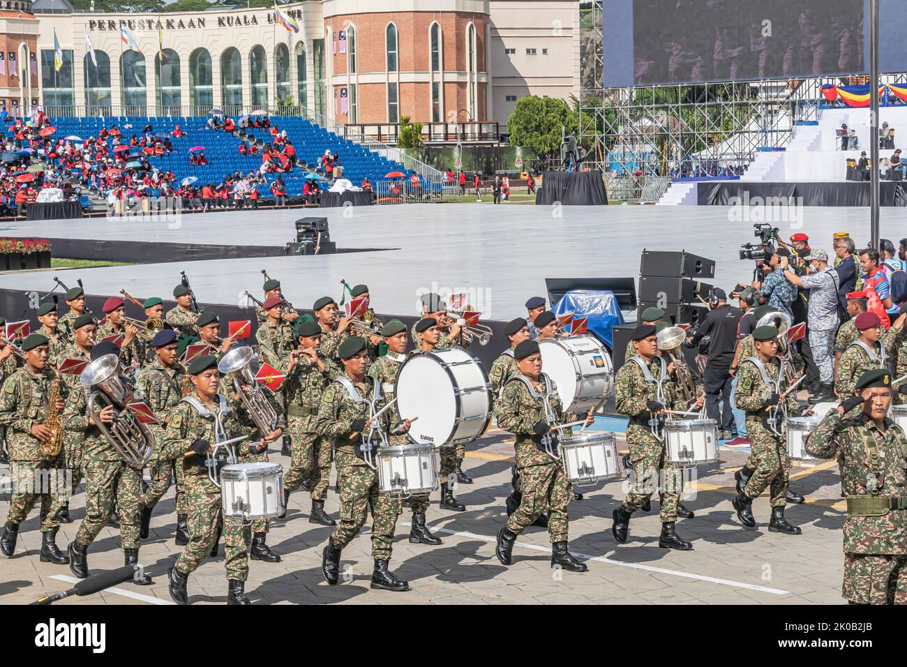 Military marching band in camouflage fatigue of Malaysian Army during 65th Malaysia National Day ...