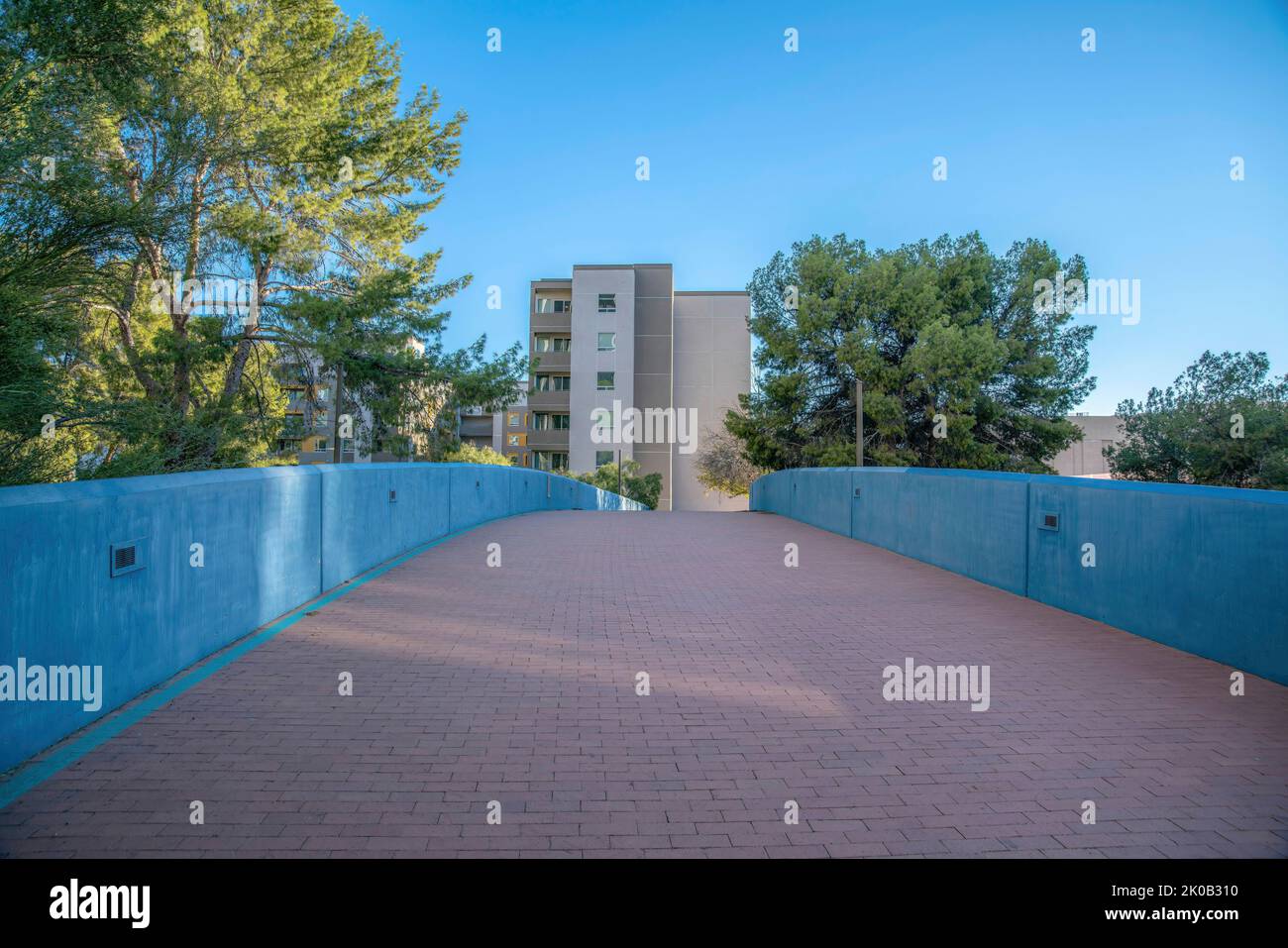 Pedestrian bridge with red bricks pavement in downtown Tucson, Arizona ...