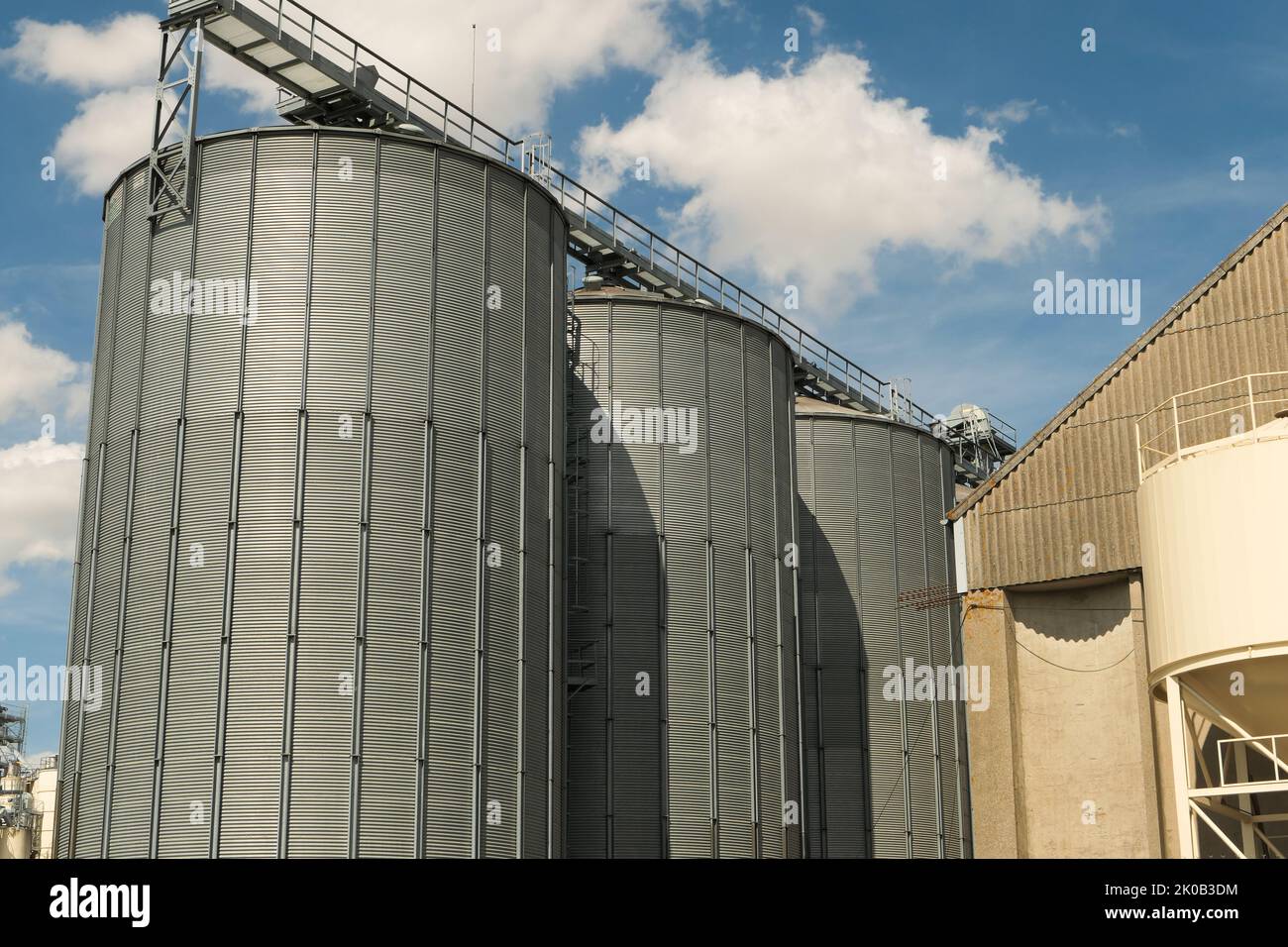 Steel tank containing food products. Grain silo Stock Photo - Alamy