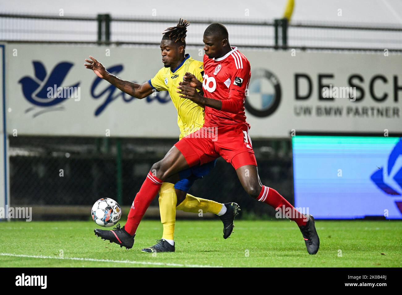 Beveren's Sheldon Bateau and SL16's Boubou Diallo pictured in action ...