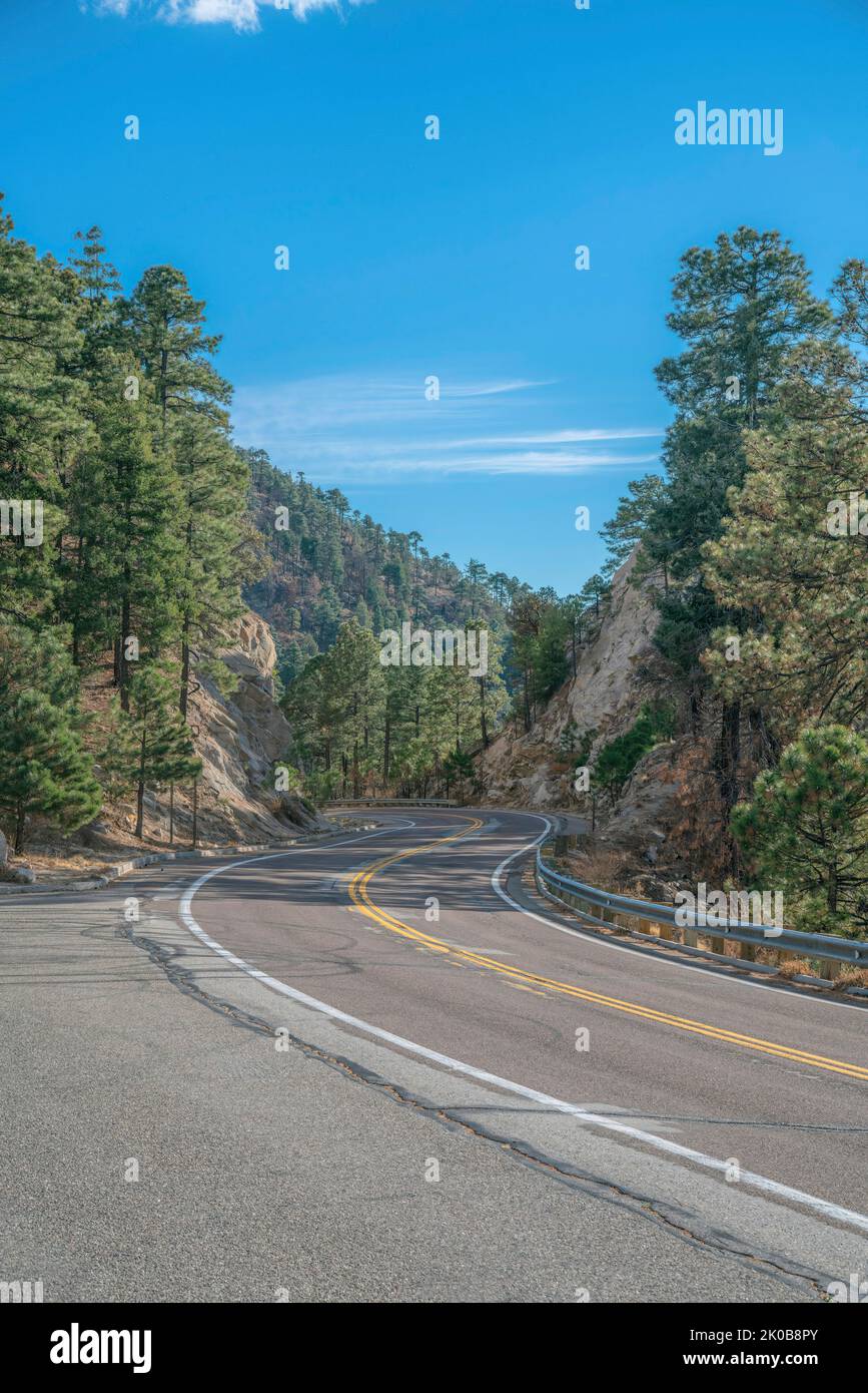 Mount Lemmon, Arizona- Curved road in between rocky mountain slope and ...