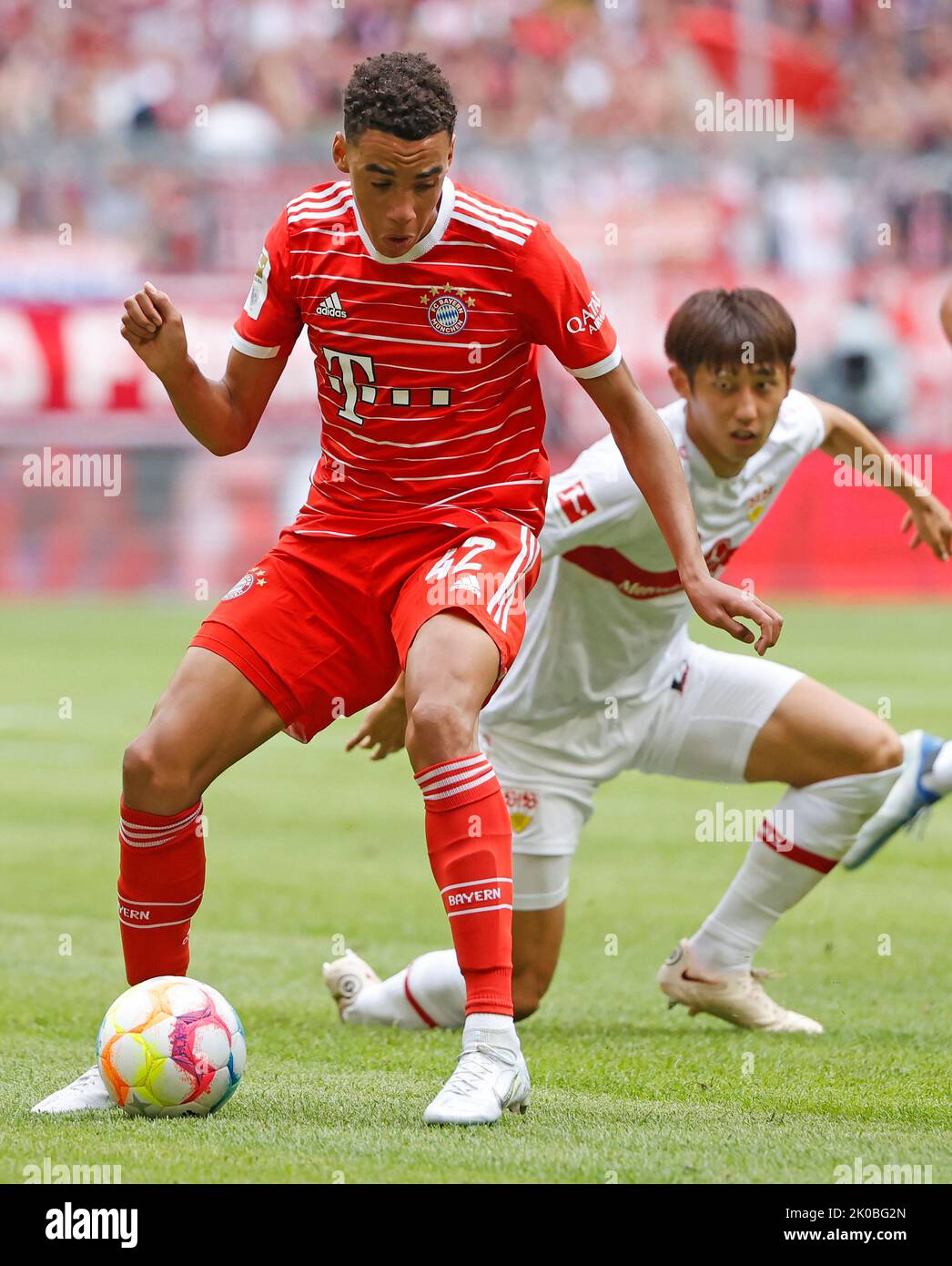 Munich, Germany. 11th Sep, 2022. Jamal Musiala (L) of Bayern Munich ...