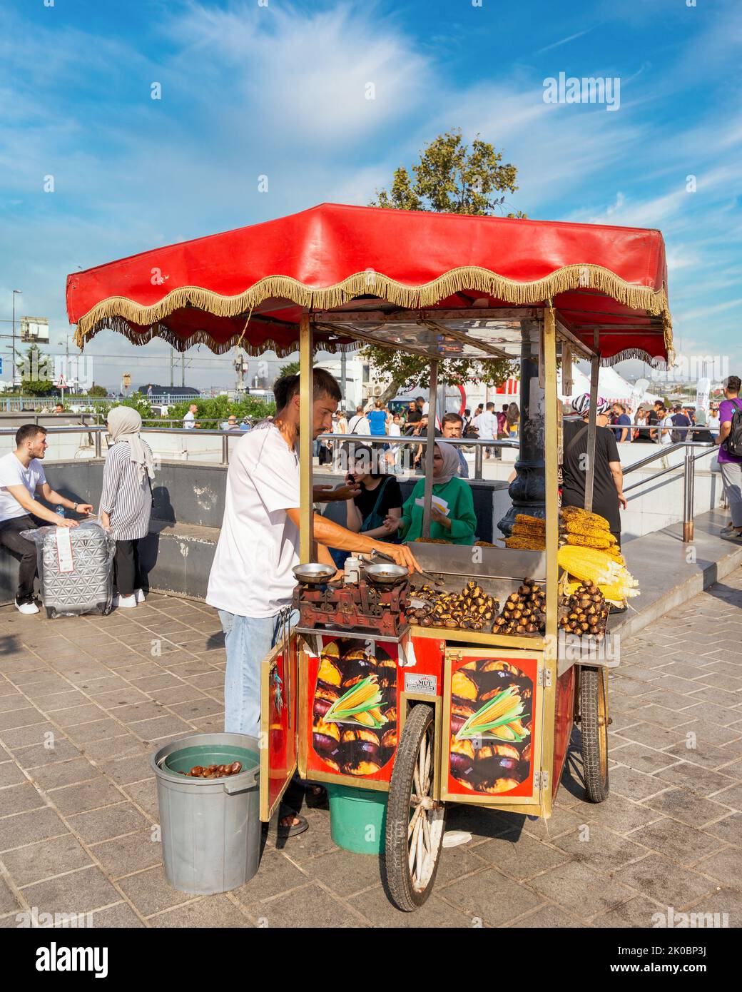 Istanbul, Turkey - August 30, 2022: Young man selling chestnut and corn ...
