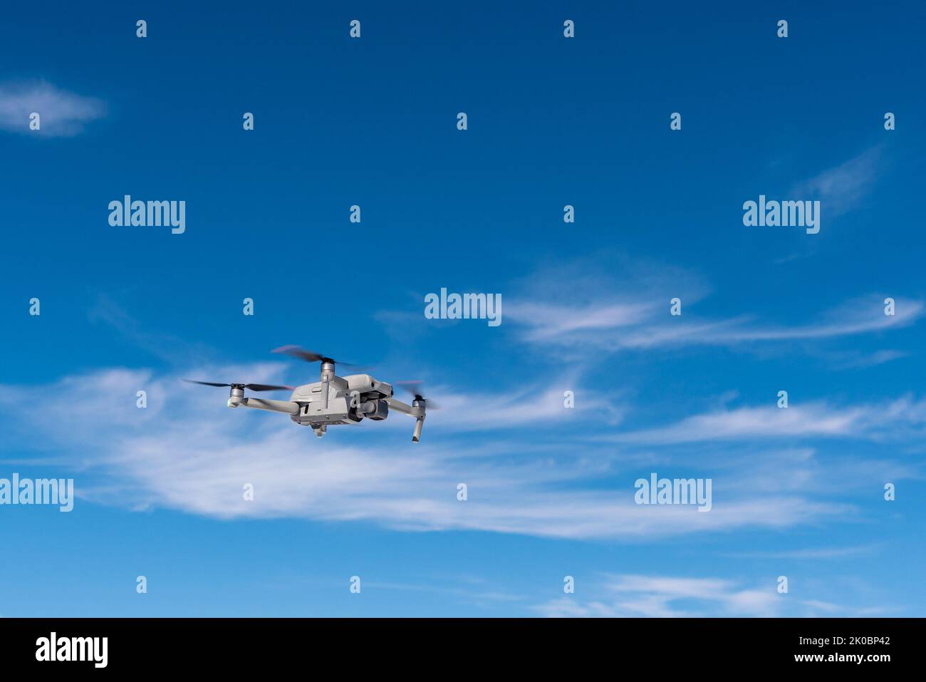 Drone in flight dynamics against the sky Stock Photo - Alamy