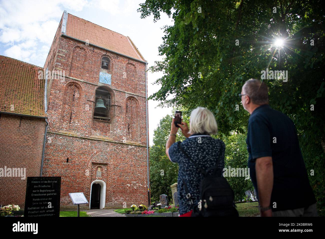 Suurhusen, Germany. 09th Sep, 2022. Tourists take pictures of the ...