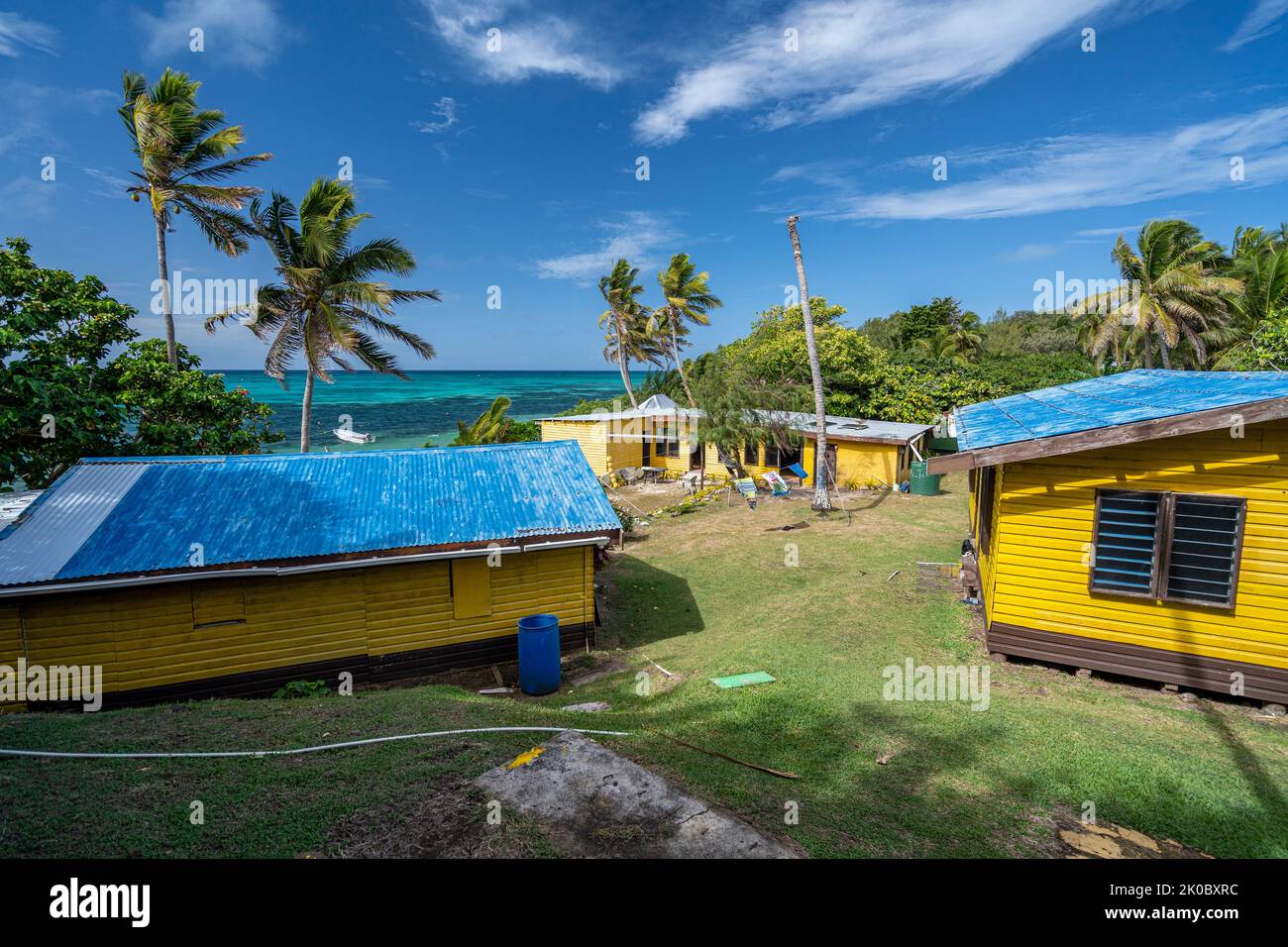 Yellow bungalows at family run homestay in village on Nanuya LaiLai ...