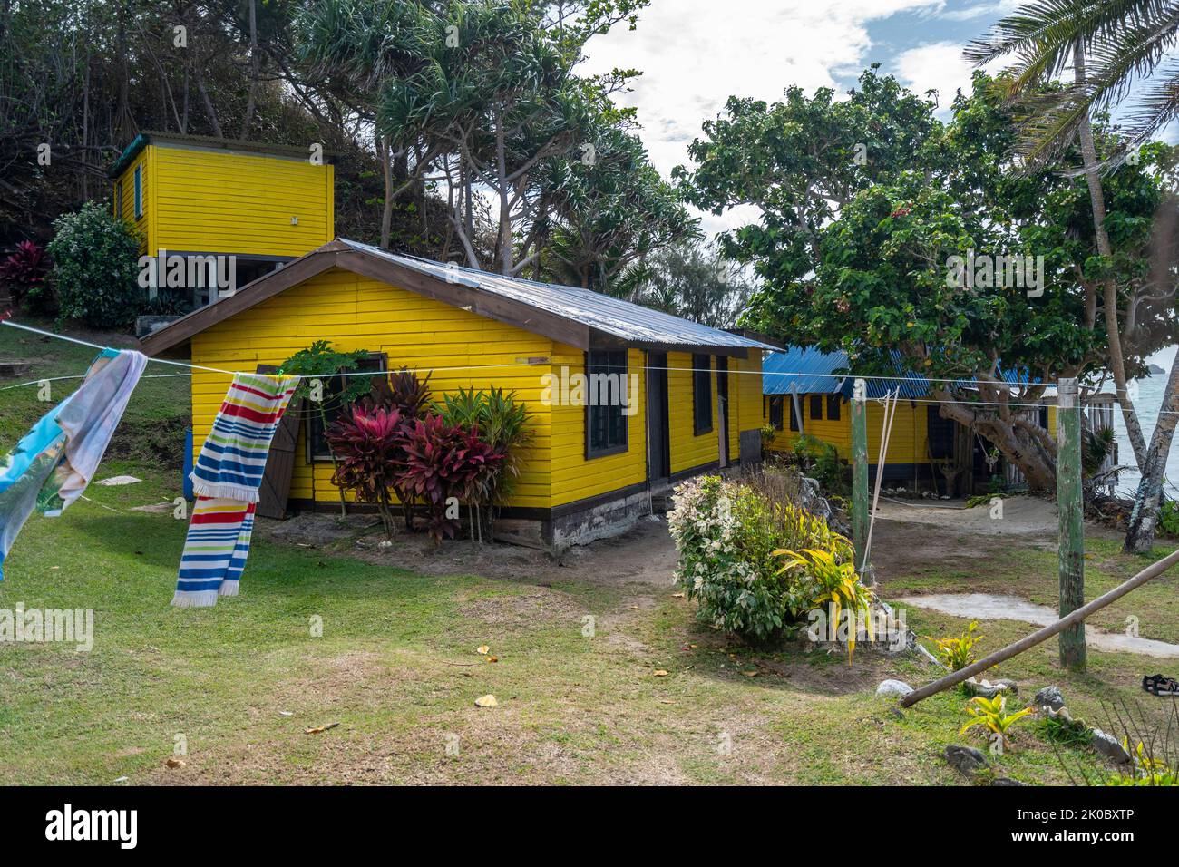 Yellow bungalows at family run homestay in village on Nanuya LaiLai ...