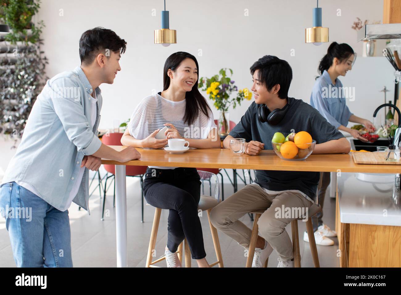 Happy Chinese friends having fun together Stock Photo - Alamy