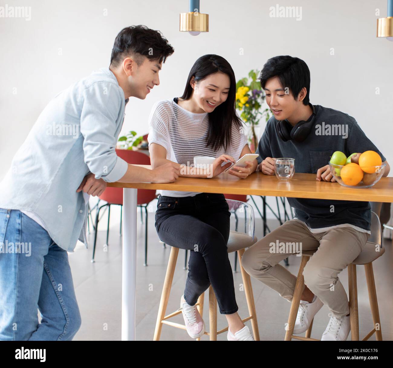 Happy Chinese friends having fun together Stock Photo - Alamy