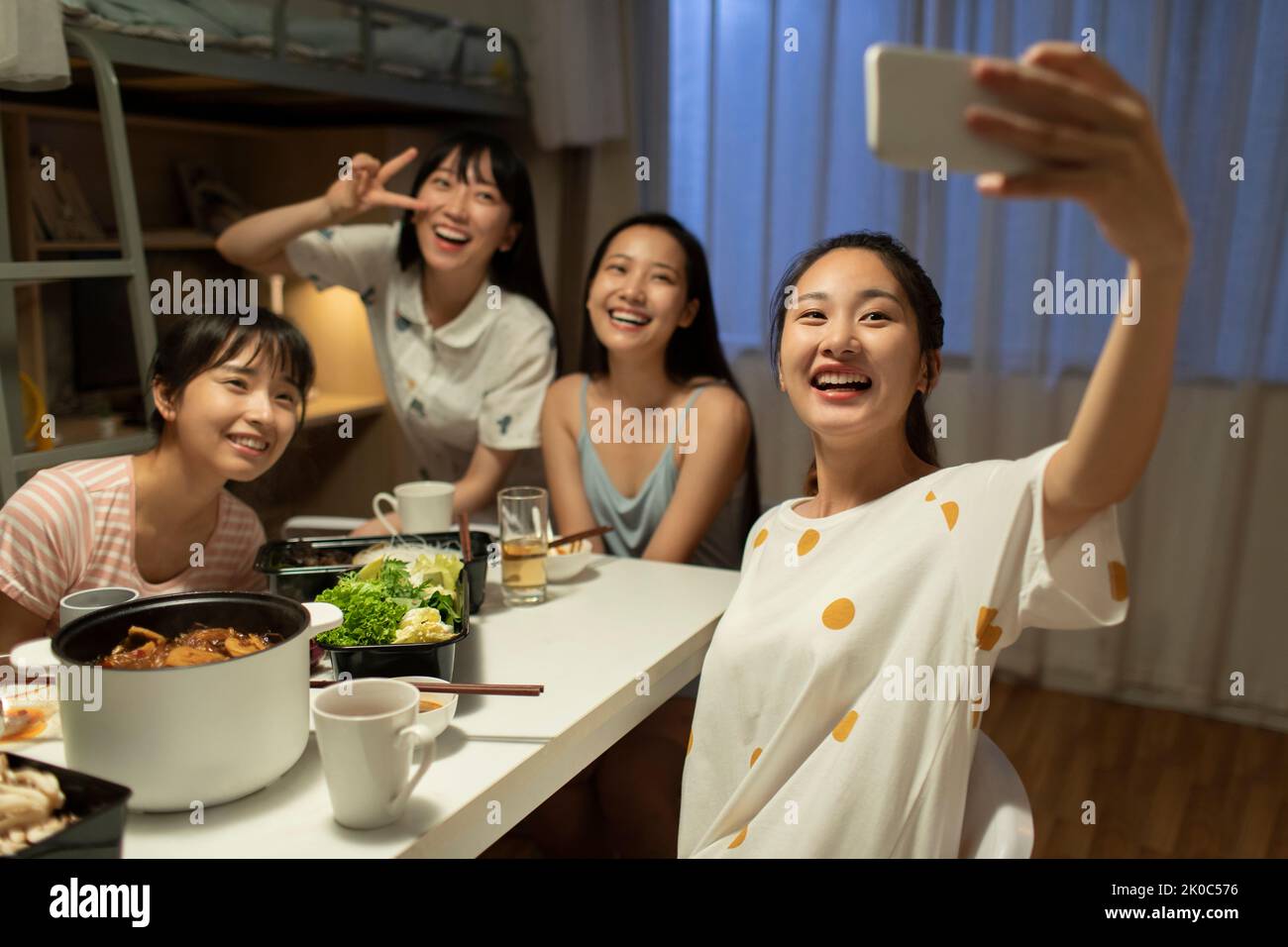 Young Chinese university students having chaffy dish in dormitory Stock ...