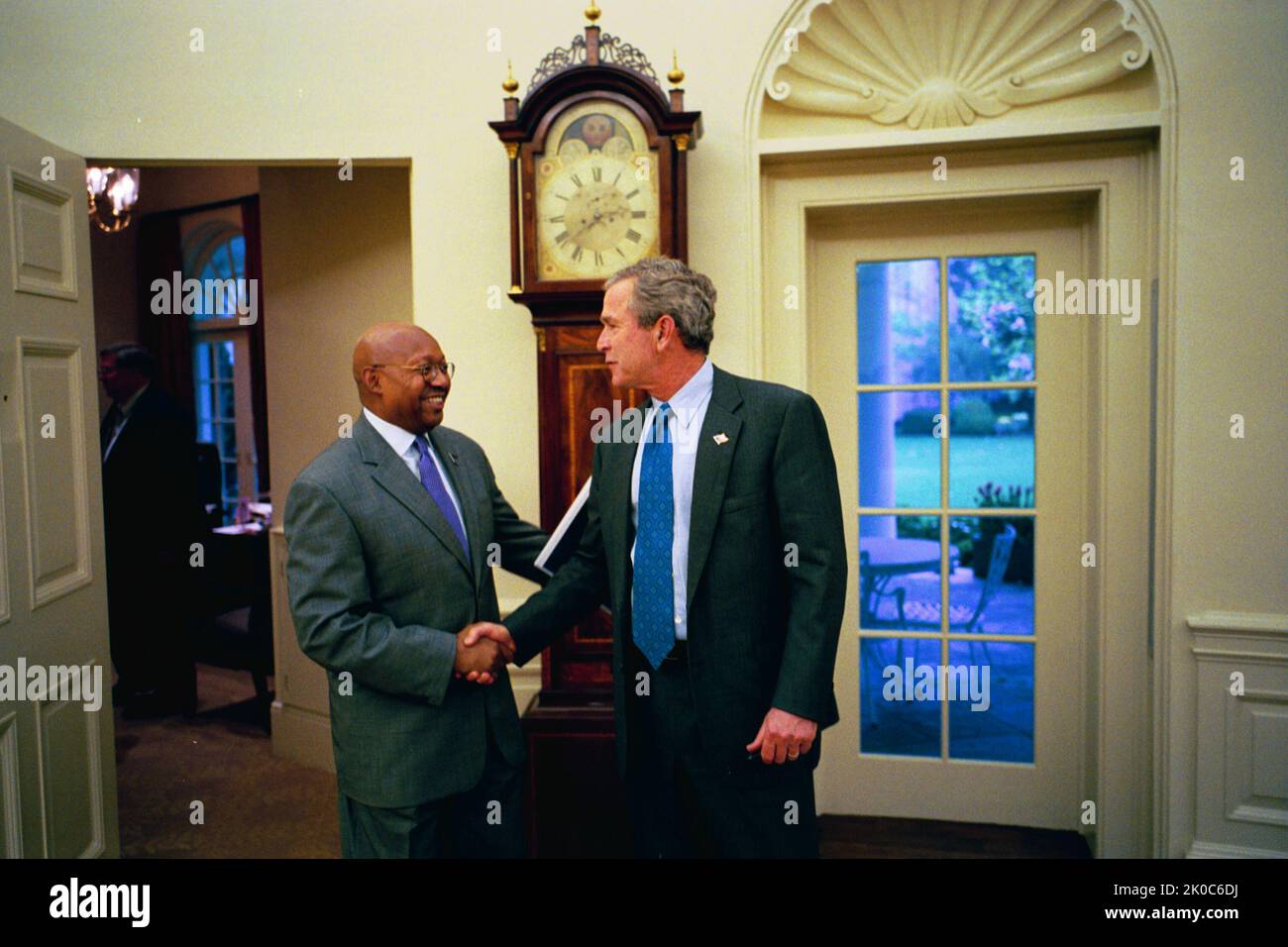 Secretary Alphonso Jackson with President George W. Bush in Oval Office ...