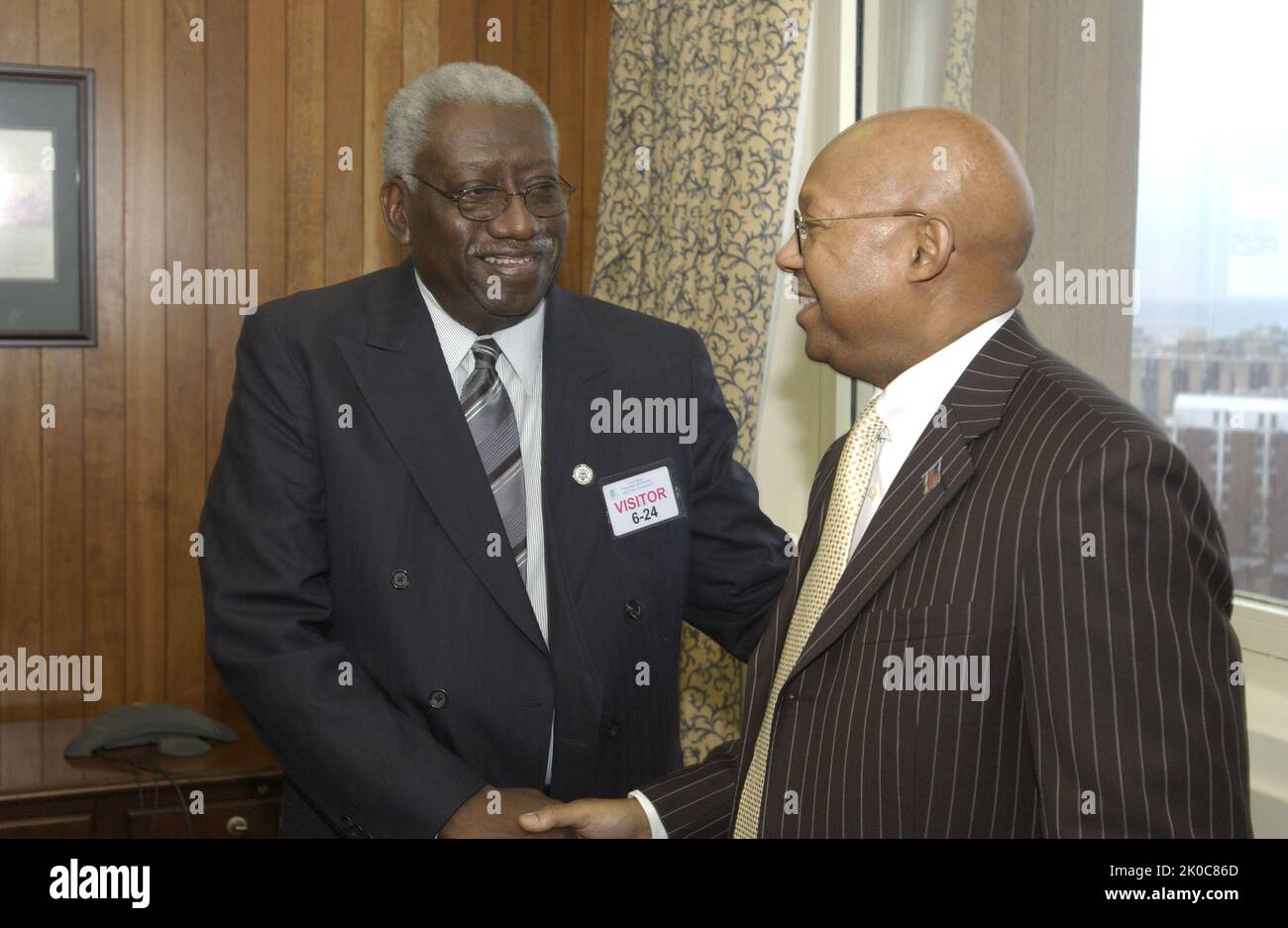 Acting Secretary Alphonso Jackson with H.R. Crawford. Acting Secretary ...