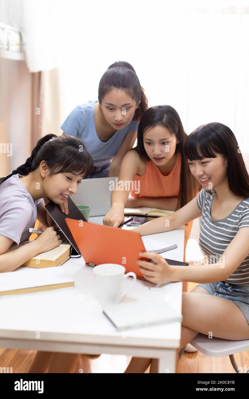 Young Chinese university students learning in dormitory Stock Photo - Alamy