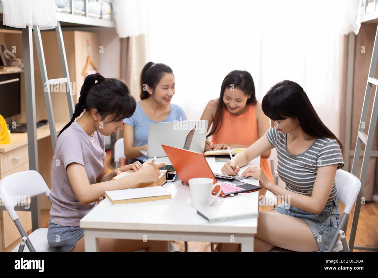 Young Chinese university students learning in dormitory Stock Photo - Alamy