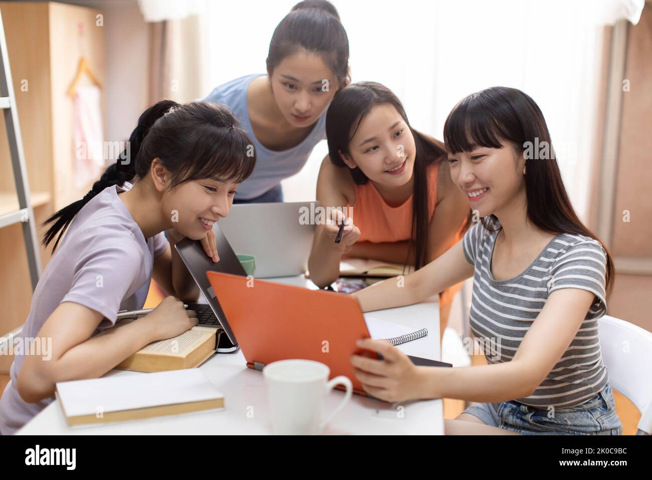 Young Chinese university students learning in dormitory Stock Photo - Alamy