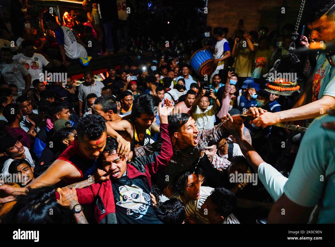 Kathmandu, Nepal. 10th Sep, 2022. Youths drink homemade alcohol pouring ...