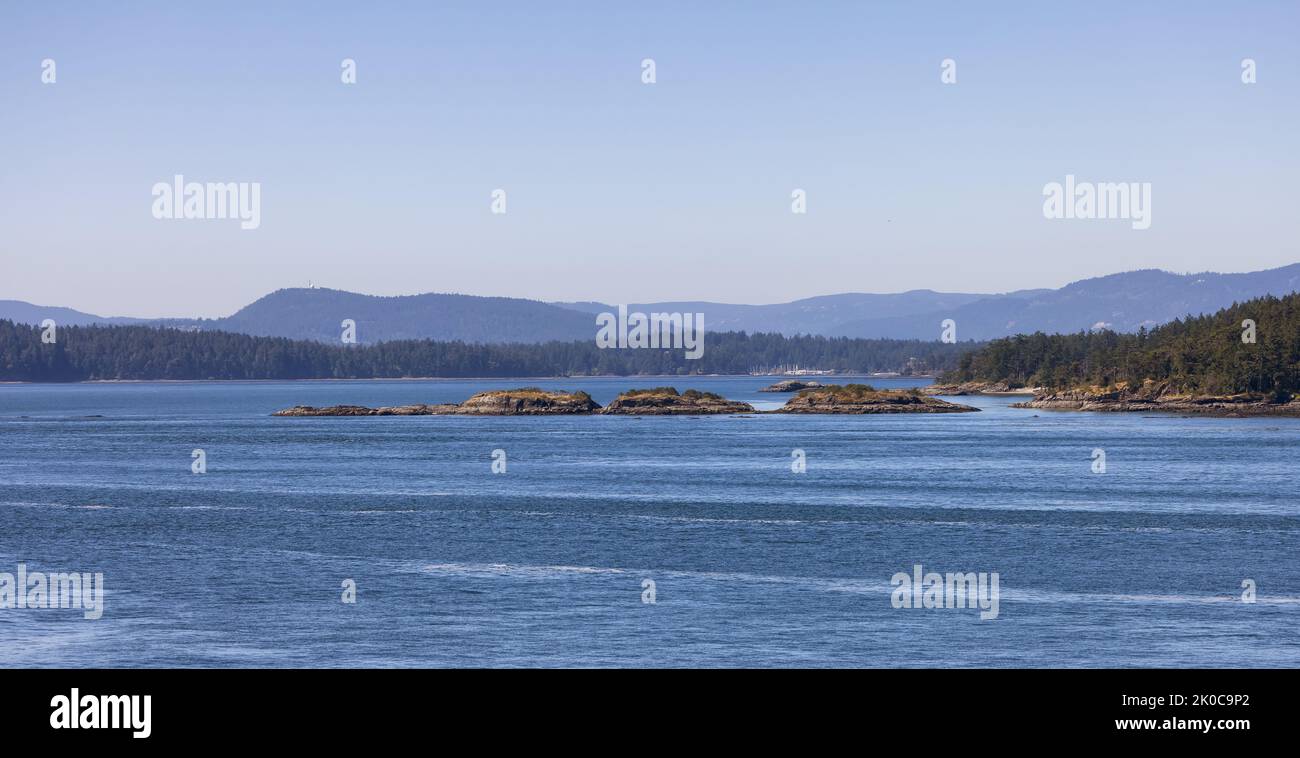 Canadian Landscape by the ocean and mountains. Summer Season Stock ...