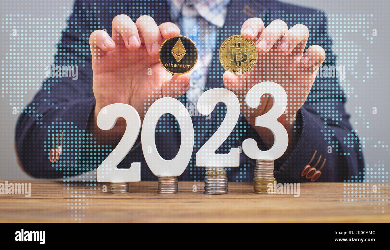 Businessman thinking about investing in cryptocurrency in 2023, choice ...