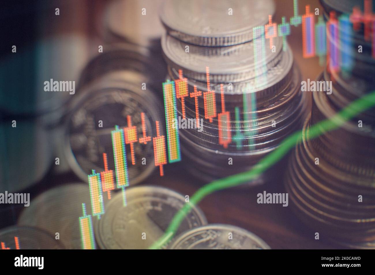 Double exposure of city night and stack of coins for finance investor ...