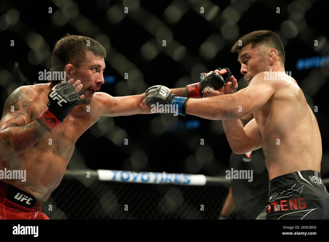 LAS VEGAS, NV - September 10: Chad Anheliger (L) and Alatengheili (R ...