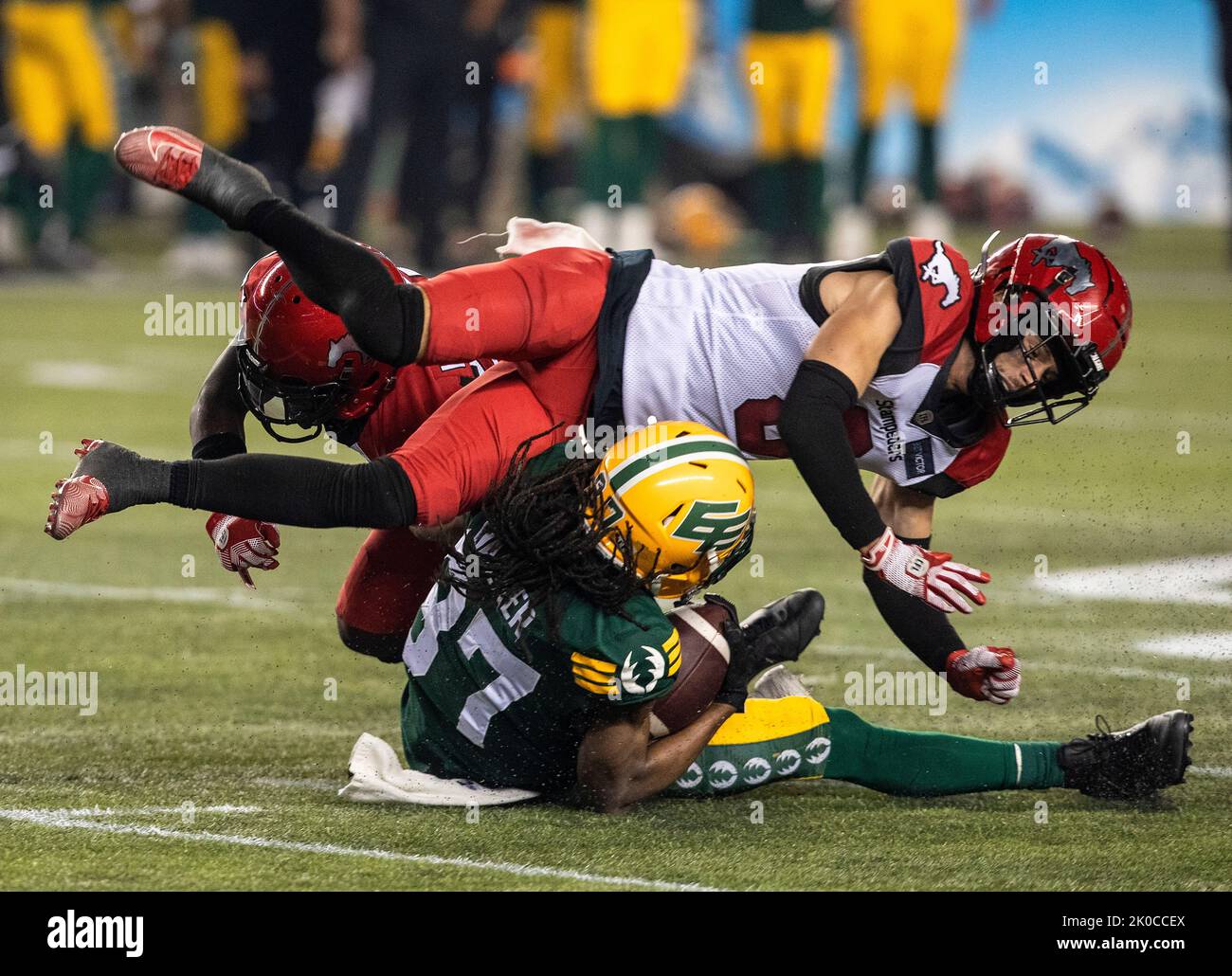 September 10, 2022, EDMONTON, AB, CANADA: Calgary Stampeders' Nick Statz (8) tackles Edmonton ...