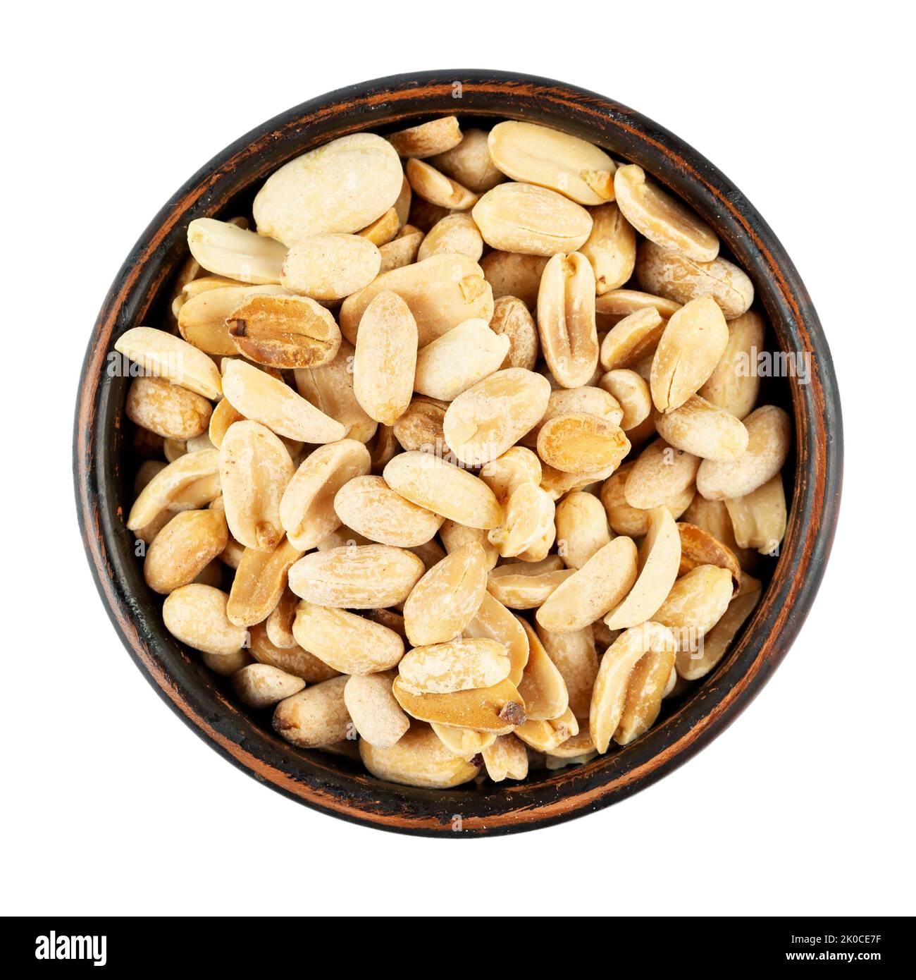 Peanuts, roasted and salted, in bowl isolated on white background ...