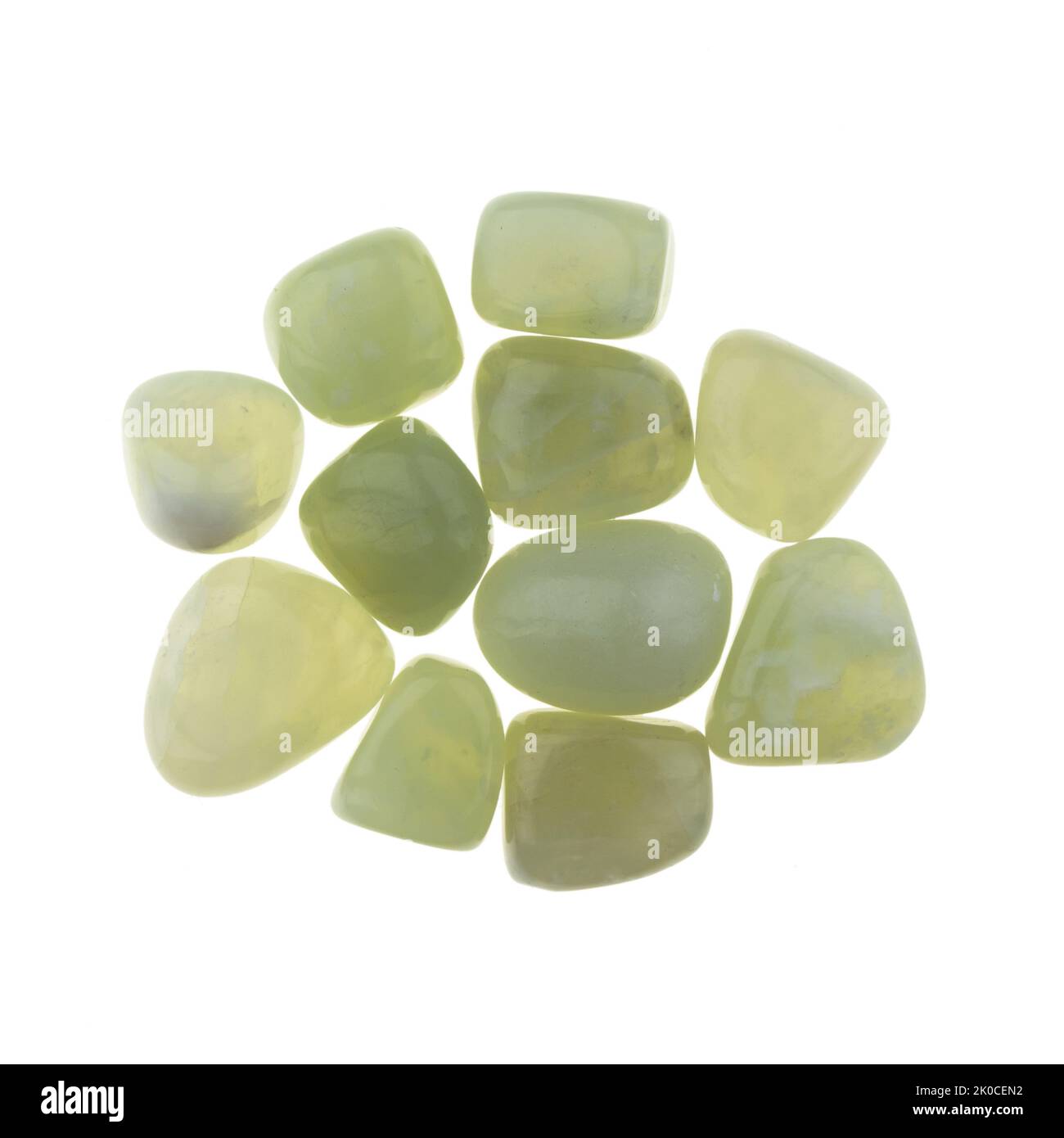 Light green sereptine or Chinese jade tumbled gemstones isolated on ...
