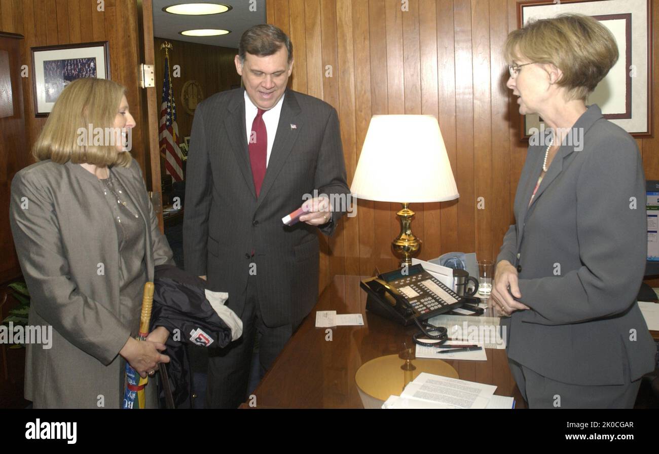 Secretary Mel Martinez with Myriam Marquez. Secretary Mel Martinez with ...