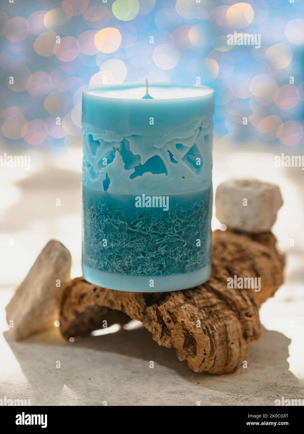 Handmade candles of a unique design, with different flowers, dry leaves ...