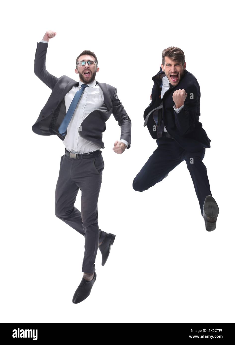 in full growth. two cheerful dancing business people Stock Photo - Alamy