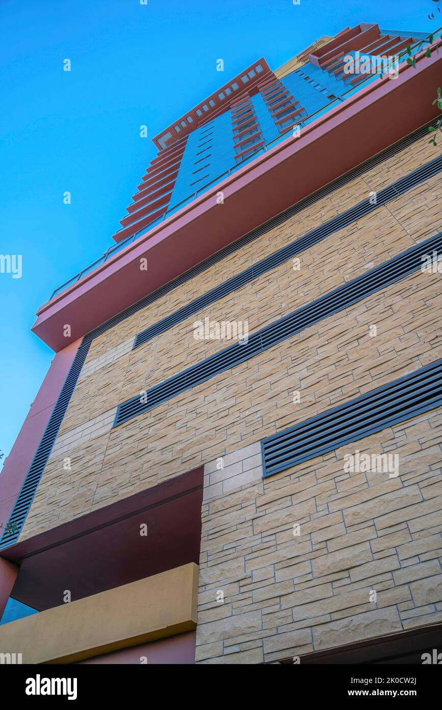 Phoenix, Arizona- Mid-rise building with stone wall cladding and wall ...